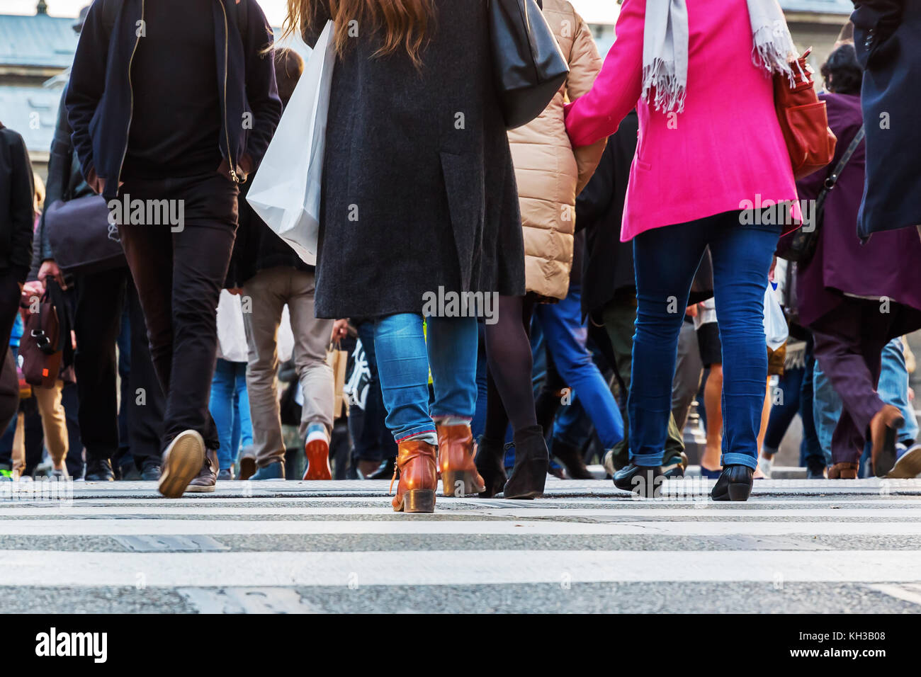 picture of crowds of people in motion blur crossing a city street Stock ...