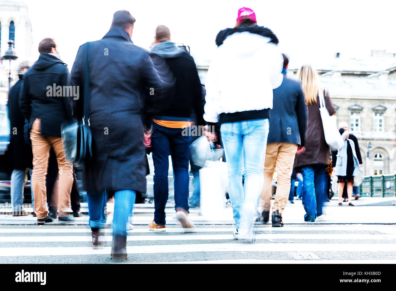 picture of crowds of people in motion blur crossing a city street Stock ...