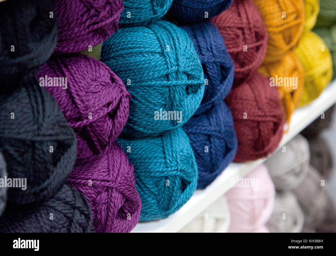 blue, green, yellow, purple, red yarn Stock Photo - Alamy