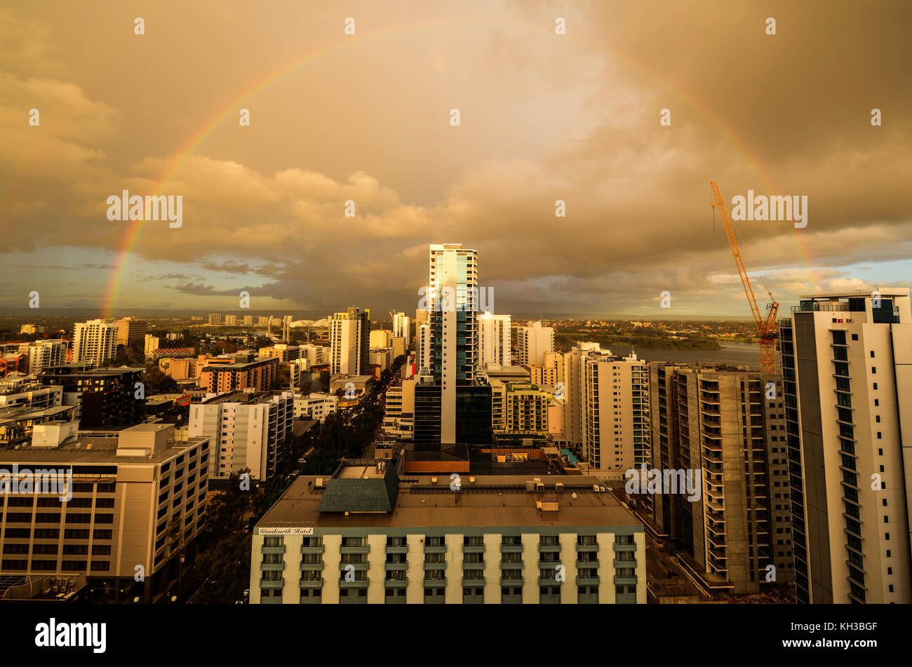 Perth, Australia Skyline at sunset looking westward with a rainbow in ...