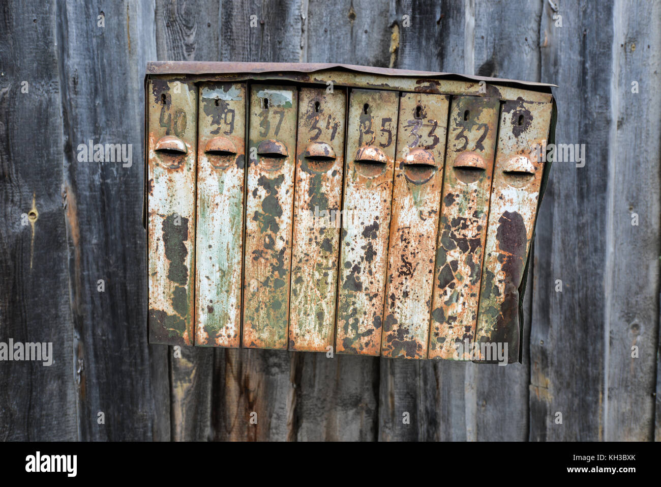 Old Rusty Russian Mailbox. Metal Mailbox rusted over from Soviet times ...