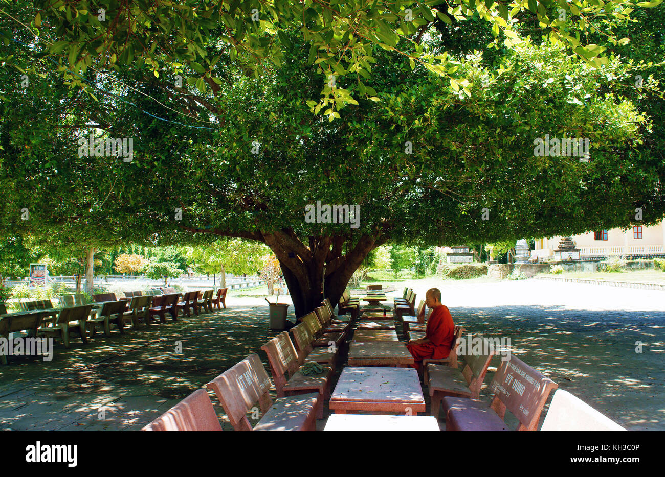 AN GIANG, VIET NAM, People have a rest under tree shadow at noon of hot ...