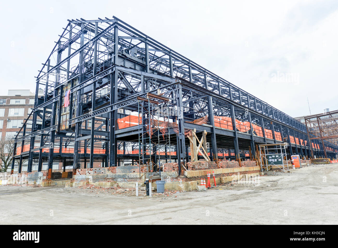 Empty warehouse/factory steel shell under construction Stock Photo - Alamy