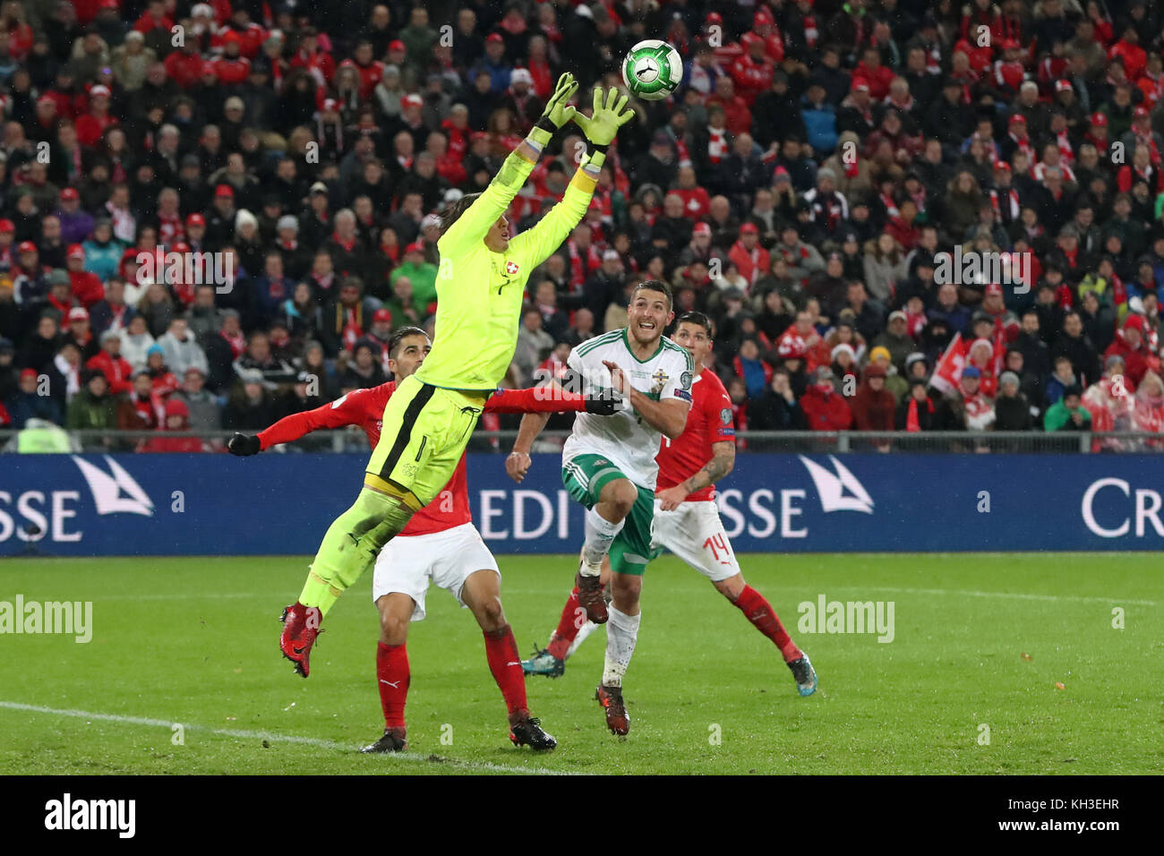 Switzerland goalkeeper Yann Sommer claims the ball under pressure ...