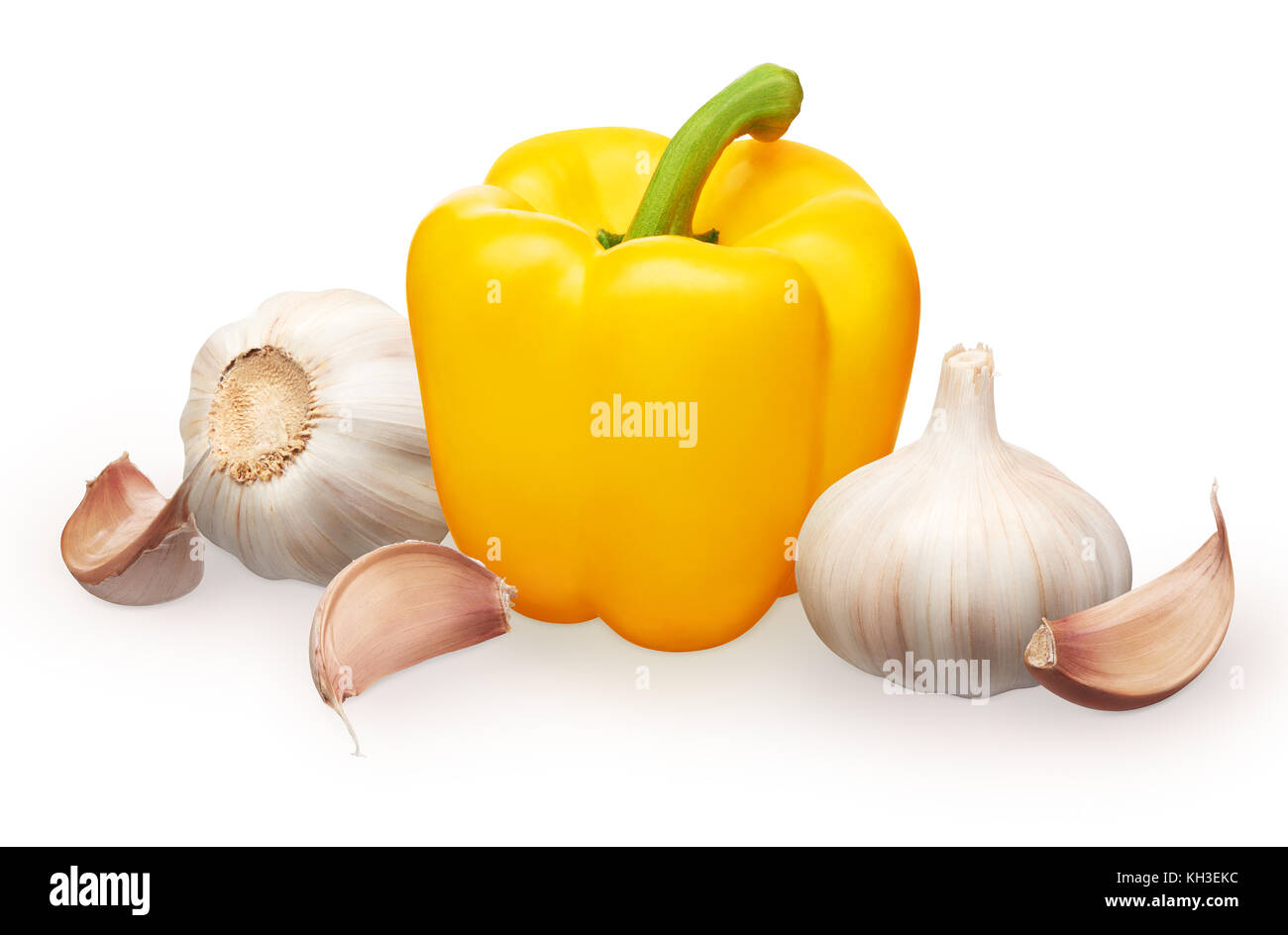 Whole fresh yellow bell pepper and garlic with cloves isolated on white ...
