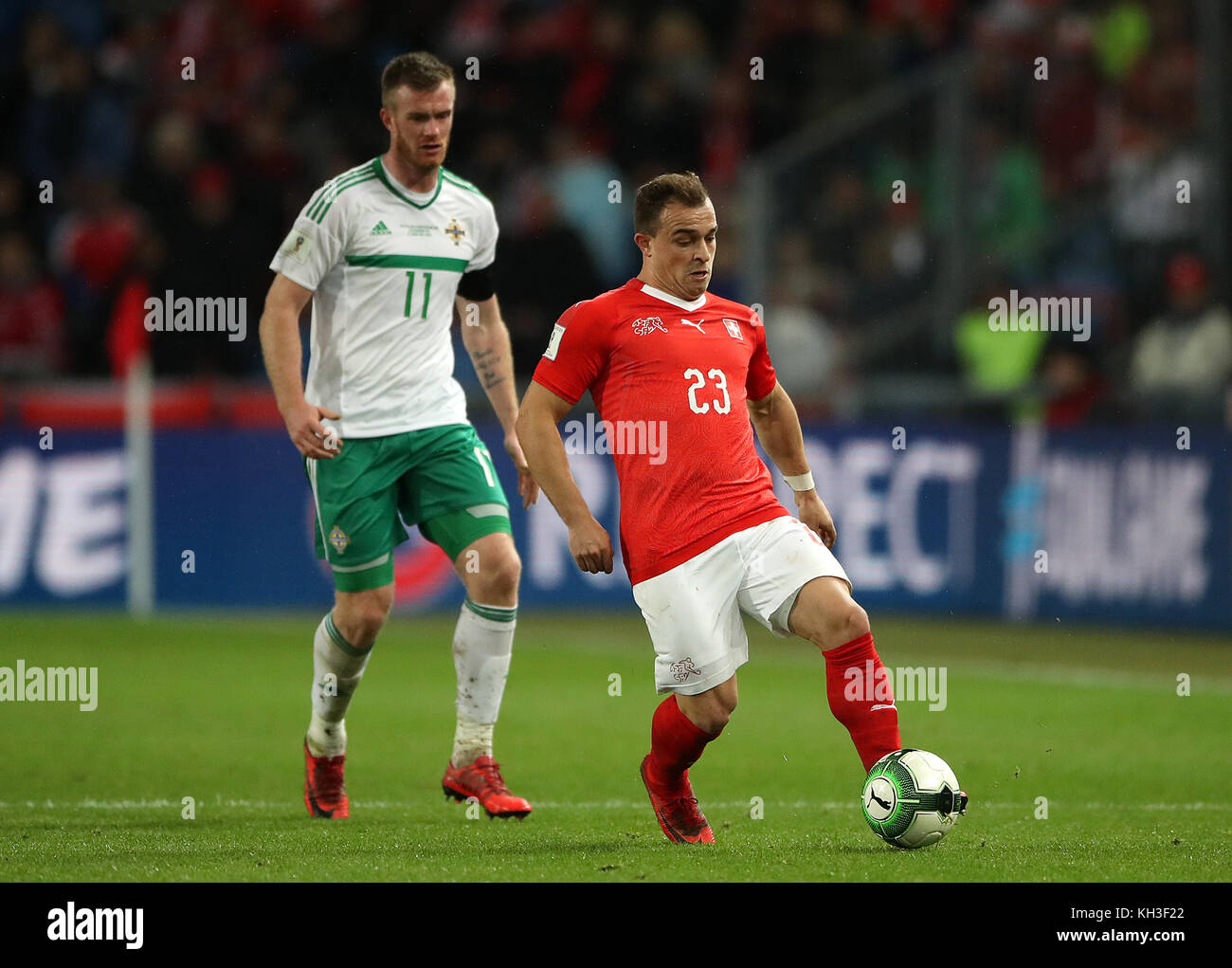 Switzerland's Xherdan Shaqiri (right) in action with Northern Ireland's ...