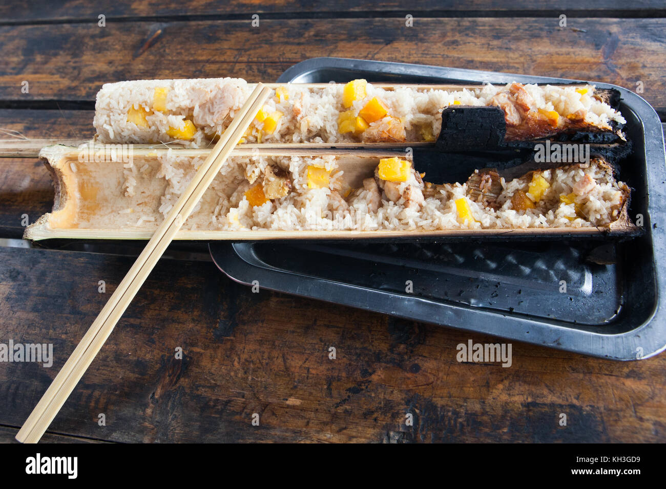 Rice in bamboo Stock Photo - Alamy
