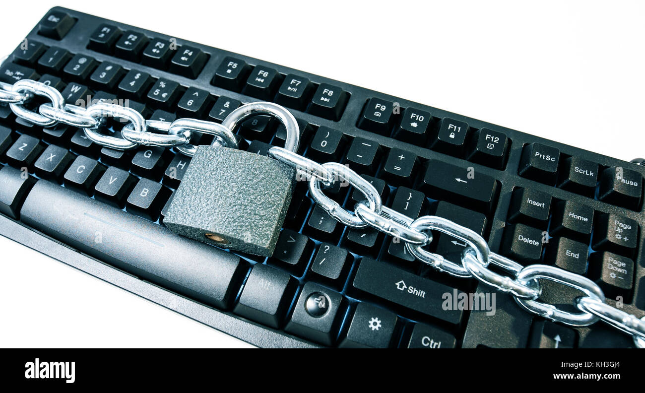 Secured computer keyboard, cyberattacks protection metaphor Stock Photo ...