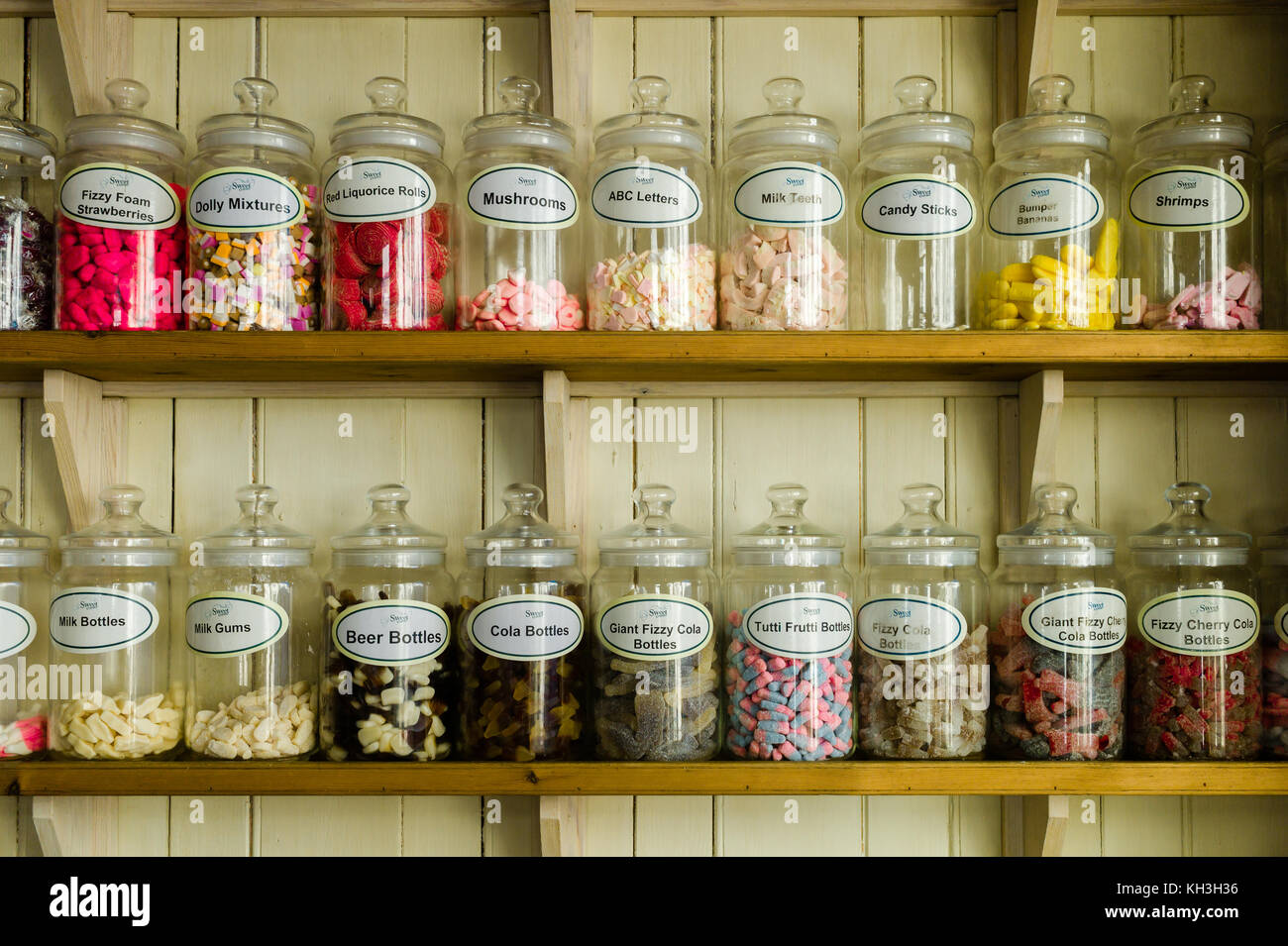 Rows of sweet jars on the shelves of Sweet Corner in the small ...