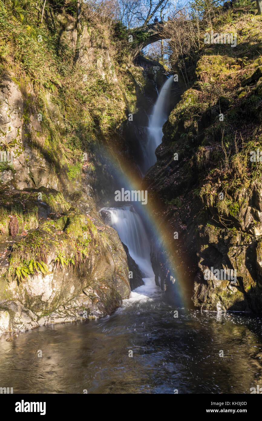 The Aira Force waterfall, managed by the National Trust with a rainbow ...