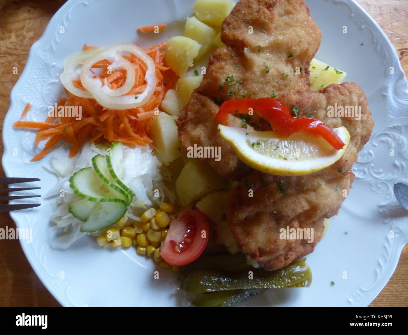 Lunch plate with Wiener schnitzel, boiled potatoes and vegetable Stock ...