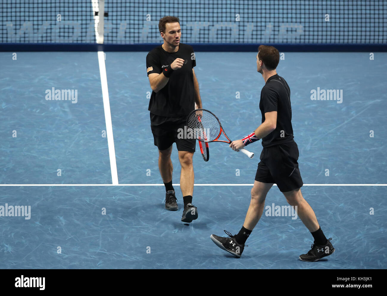 Bruno Soares (left) and Jamie Murray react during their doubles match ...