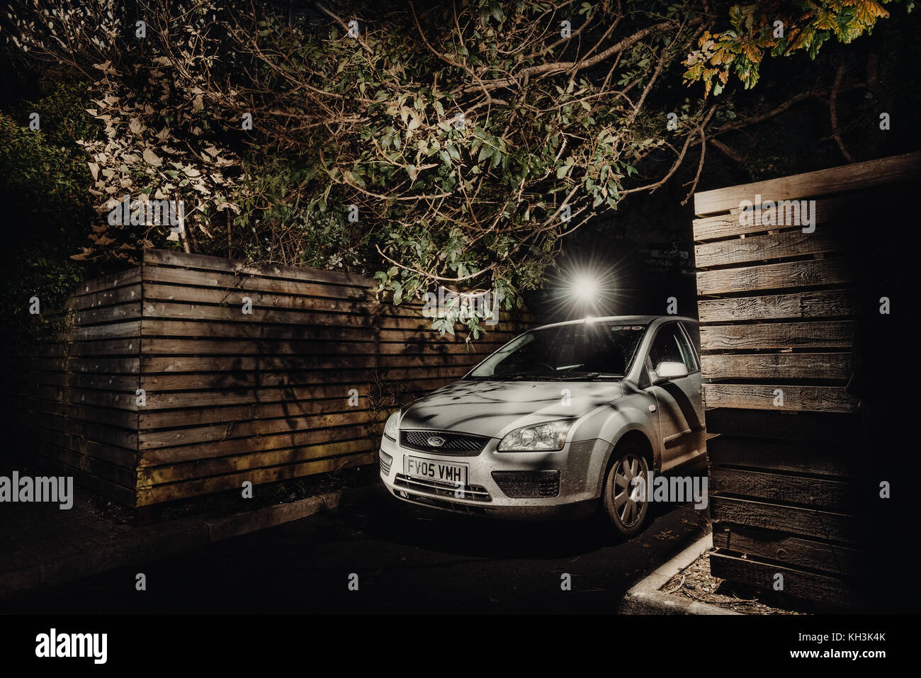 Silver Ford Focus parked outside at night, Cornwall Stock Photo - Alamy