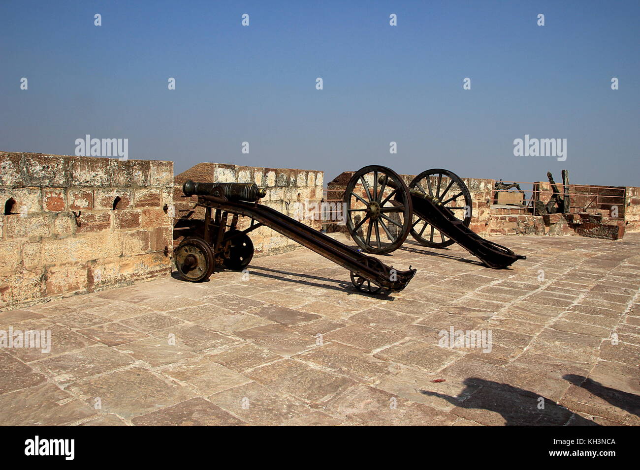 Two guns positioned at openings at parapet of terrace of Meharongarh ...