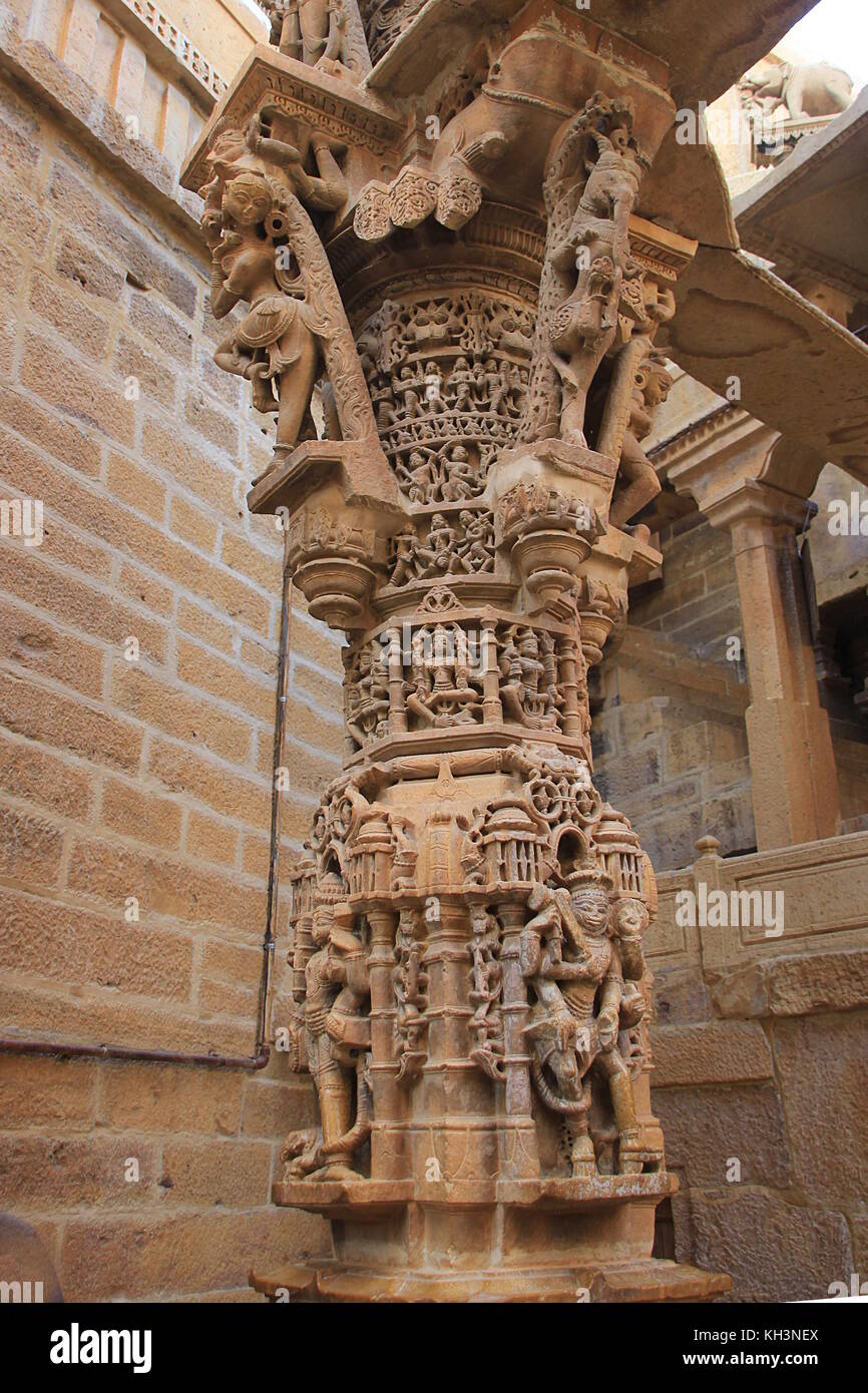 Intricately carved red marble pillar at Jain Temple in Jaisalmer Fort ...