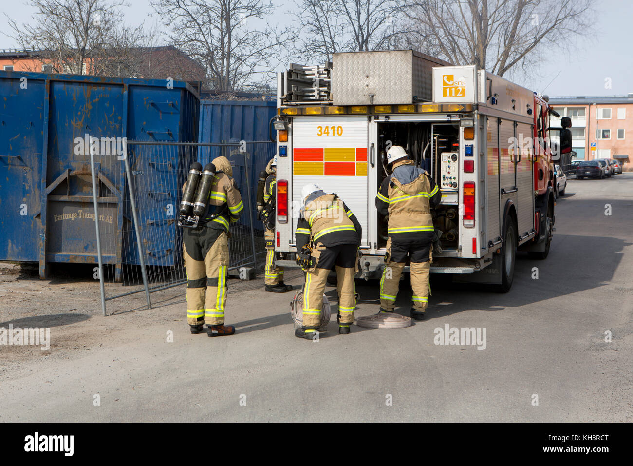 Rescue personnel at a fire, Rinkeby, Sweden Stock Photo - Alamy