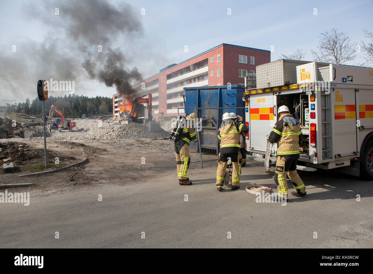 Rescue personnel at a fire, Rinkeby, Sweden Stock Photo - Alamy