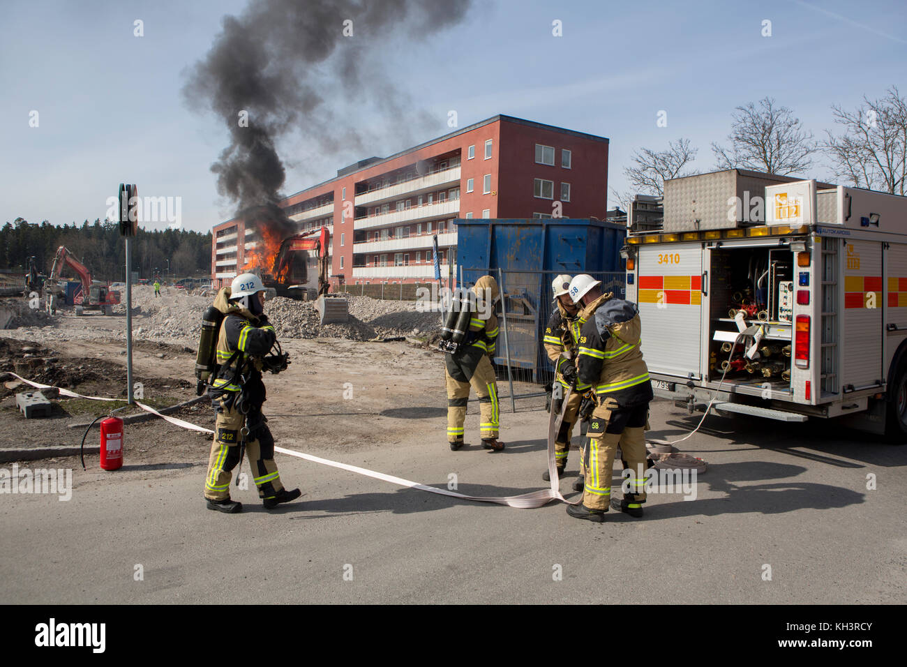 Rescue personnel at a fire, Rinkeby, Sweden Stock Photo - Alamy