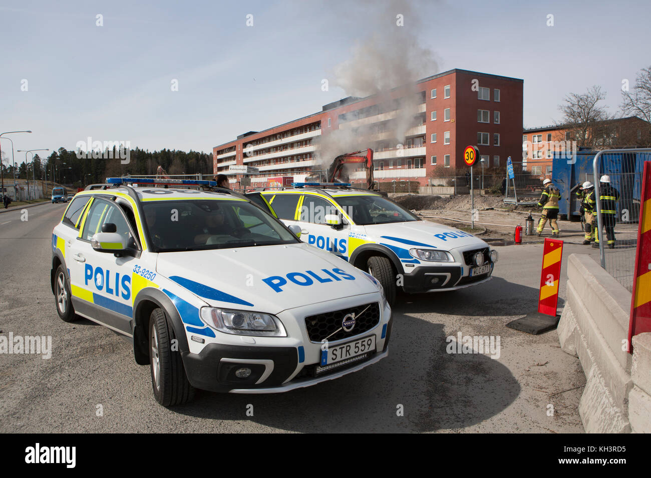 Rescue personnel at a fire, Rinkeby, Sweden Stock Photo - Alamy