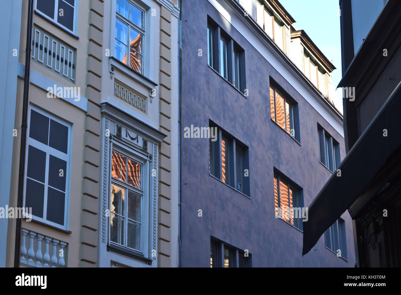 Roof reflection in windows, Riga Stock Photo - Alamy