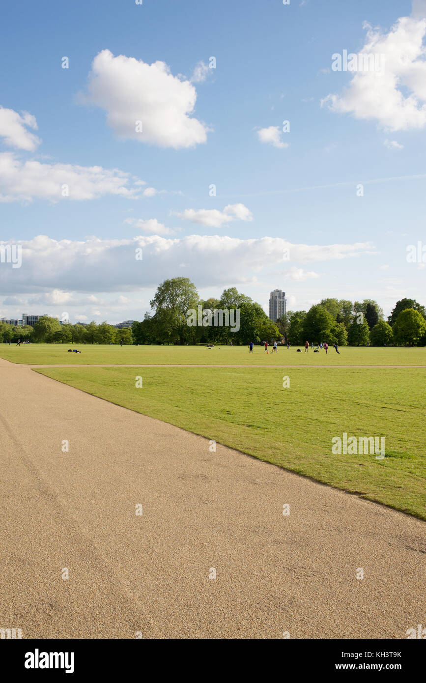 Playing football in the park hi-res stock photography and images - Alamy