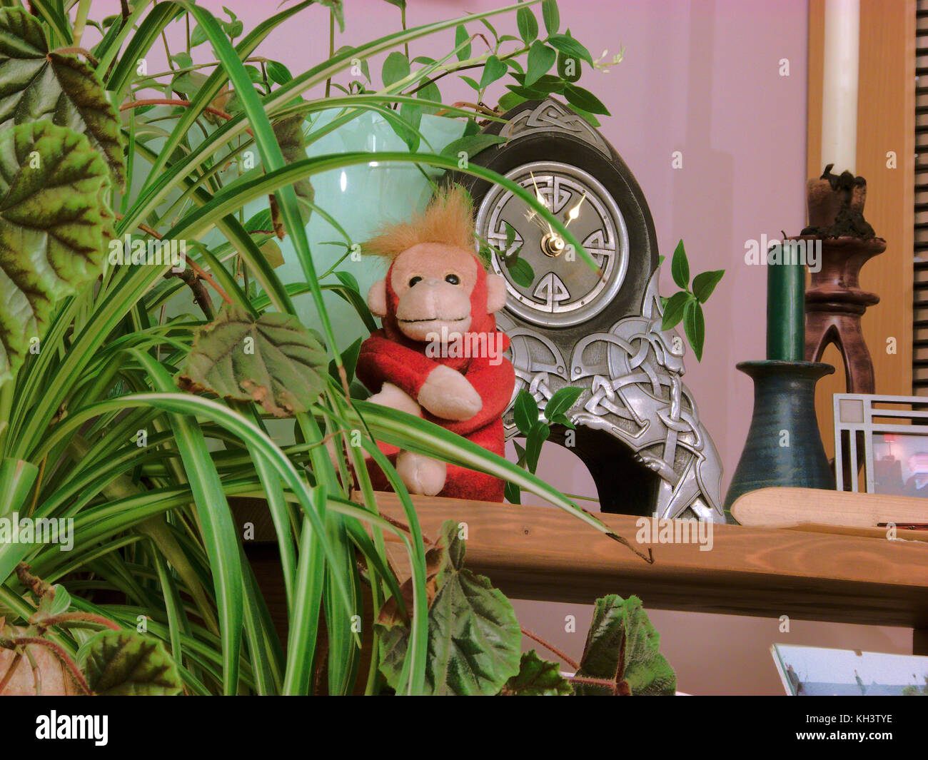 Monkey with time Stock Photo - Alamy