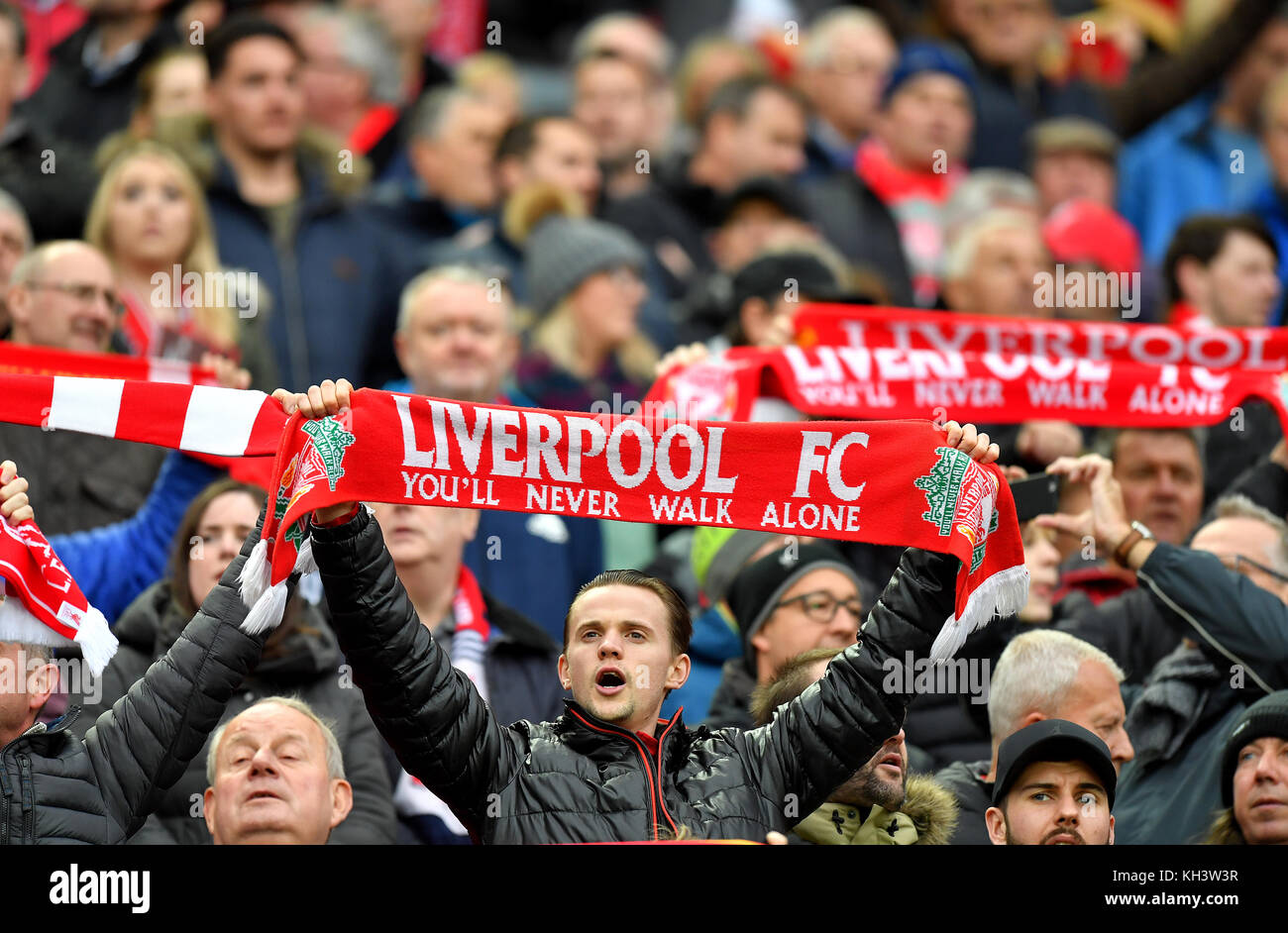 Liverpool fans show support for their team in the stands Stock Photo ...