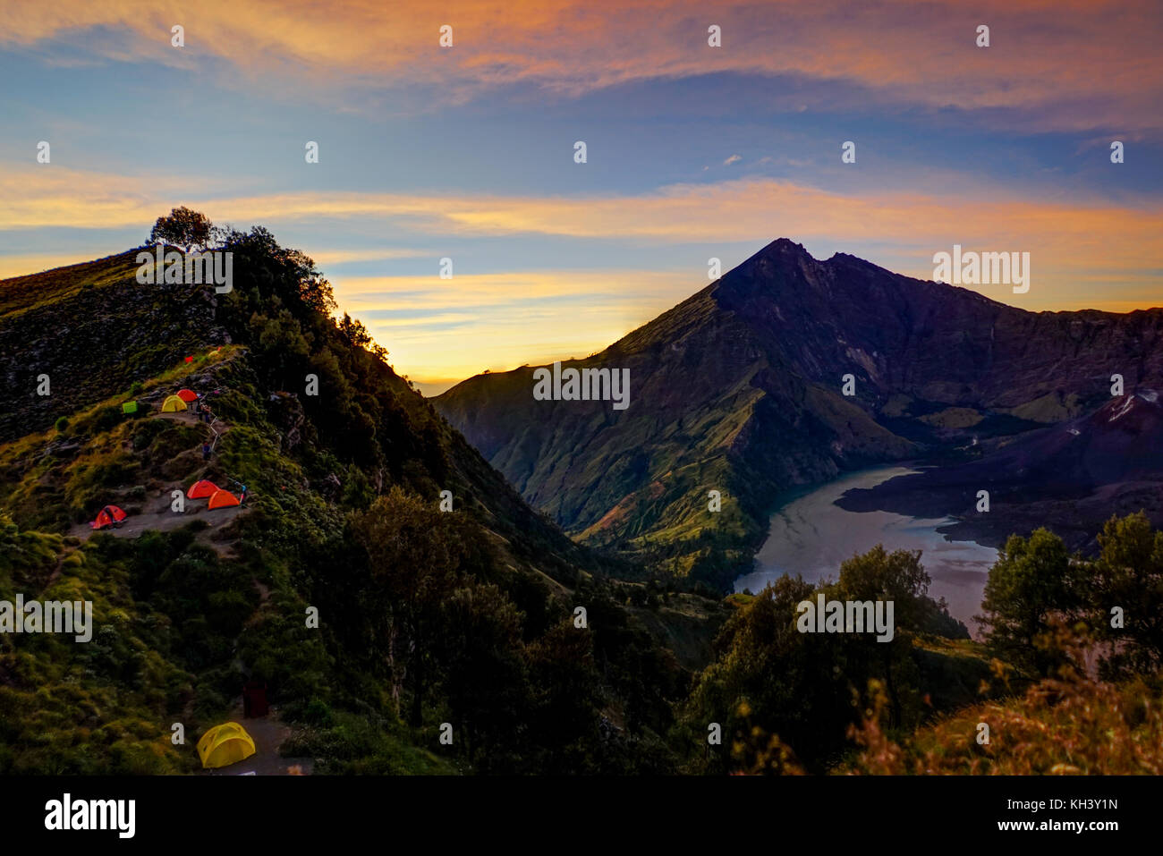 Sunrise Mount Rinjani vulcano with tents Lombok Indonesia Stock Photo ...