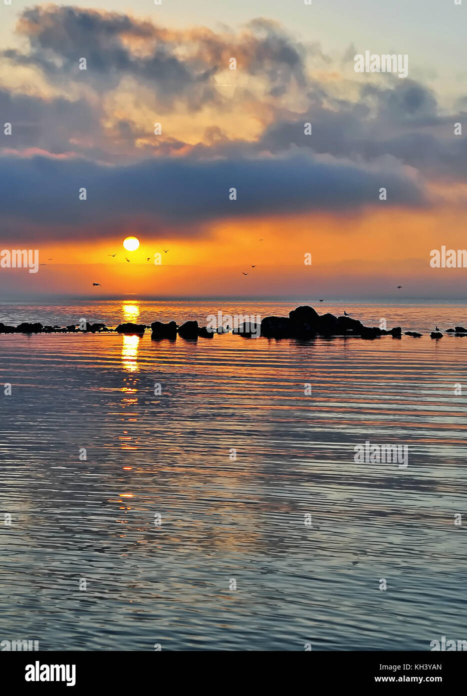 Amazing sunset on the beach Stock Photo - Alamy