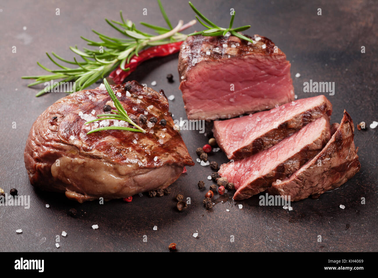 Grilled fillet steak on stone table Stock Photo - Alamy