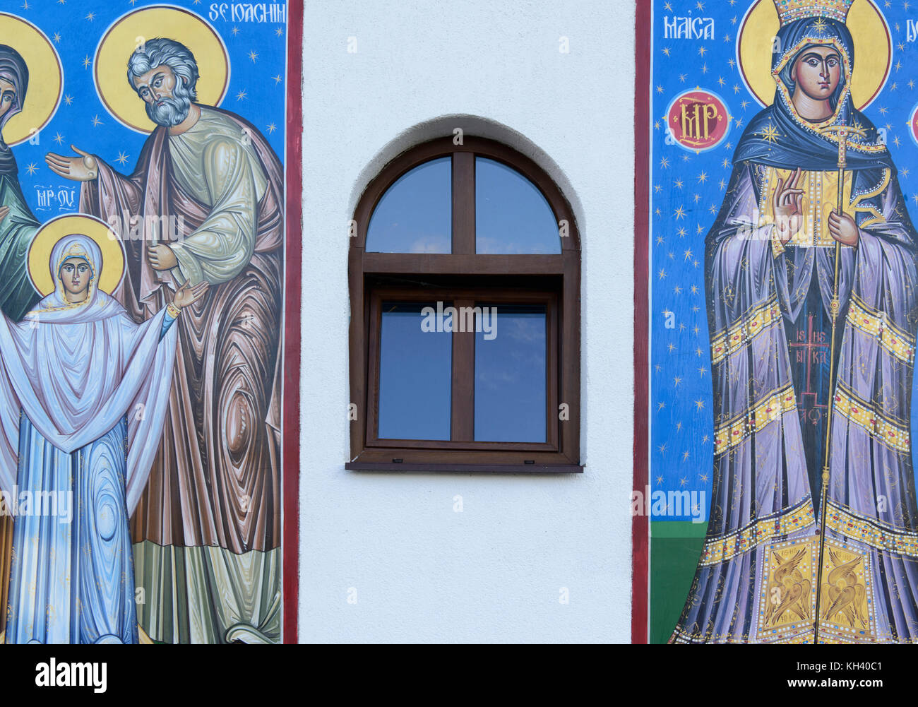 Humor Monastery. New murals on wall of new church, Romania Stock Photo ...