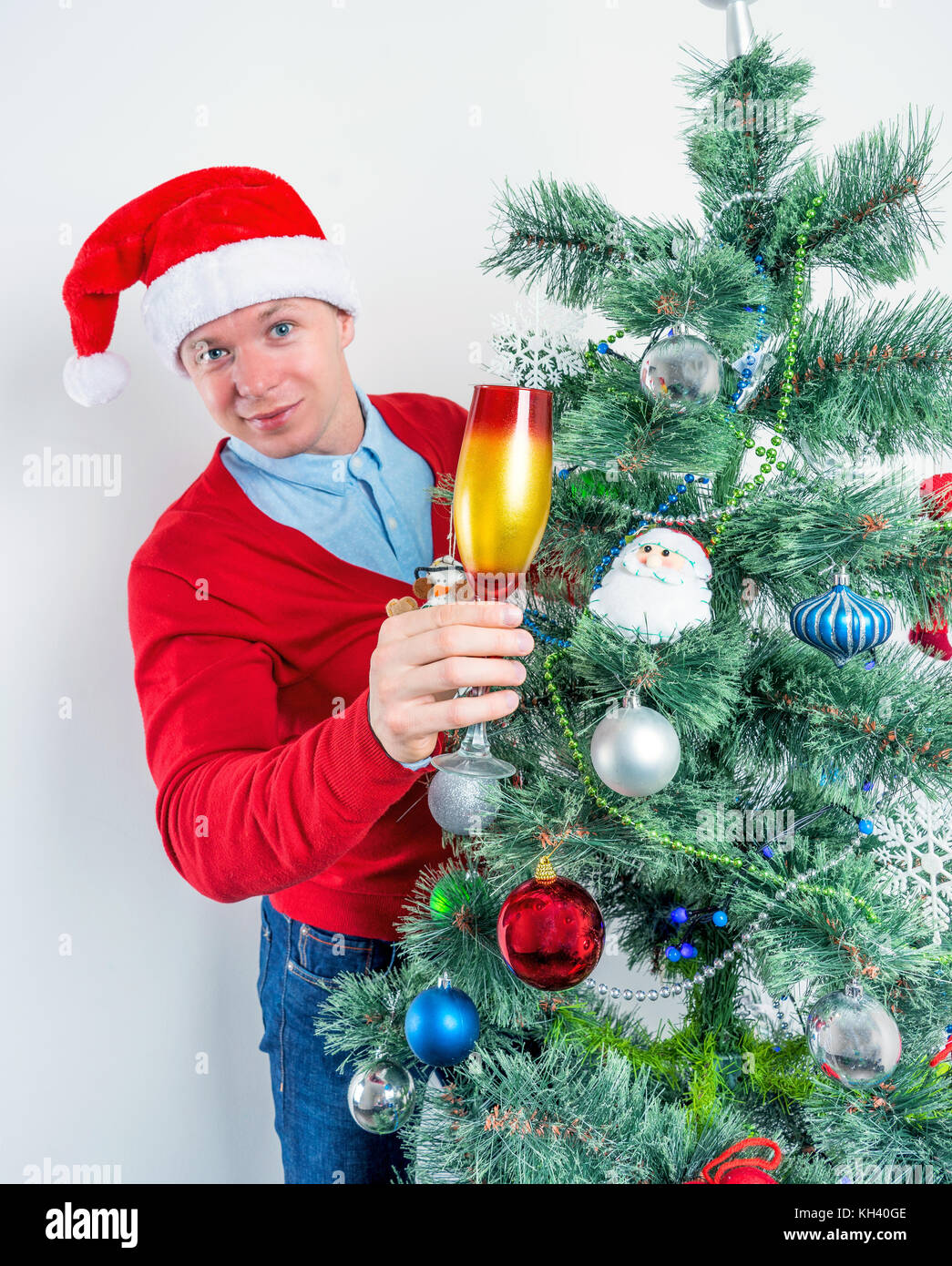 man with Christmas gift box with ribbon Stock Photo - Alamy
