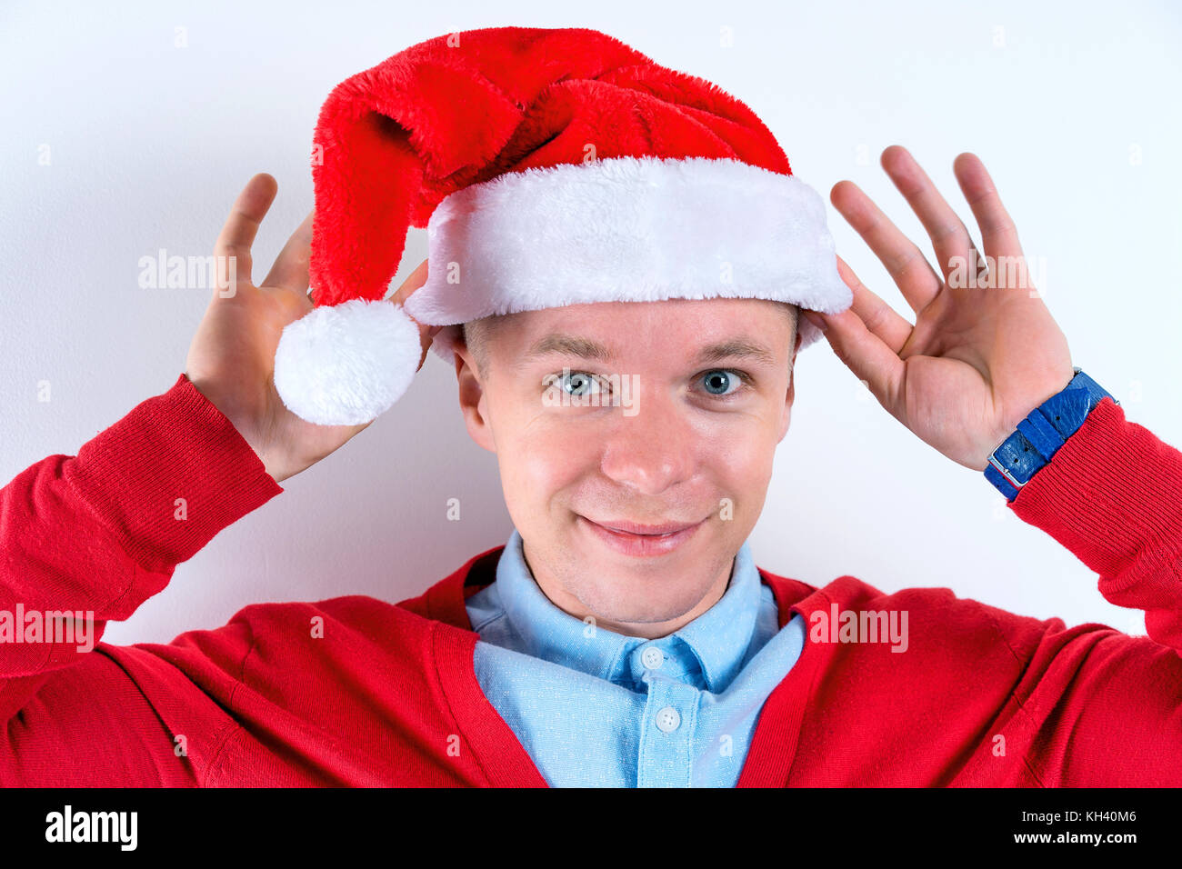 man in red Christmas hat Stock Photo - Alamy