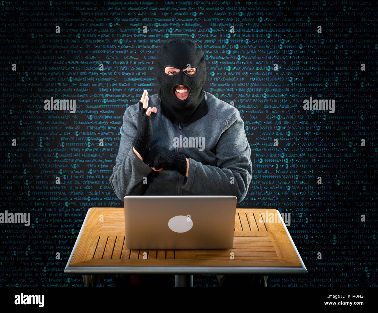 Hacker is ready to start hacking laptop Stock Photo - Alamy