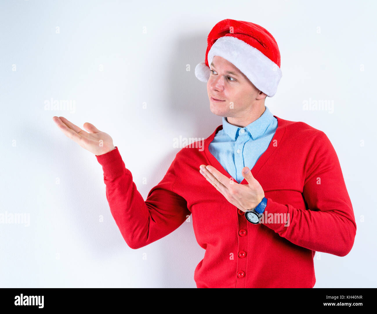 man in red Christmas hat Stock Photo - Alamy