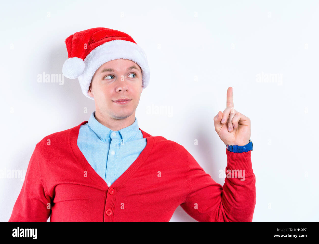 man in red Christmas hat Stock Photo - Alamy