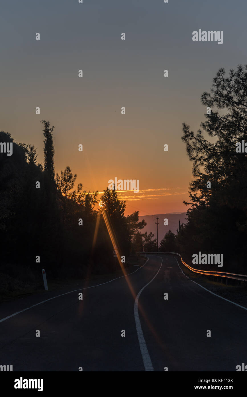 Stavrovouni monastery mountain road at sunset Stock Photo - Alamy