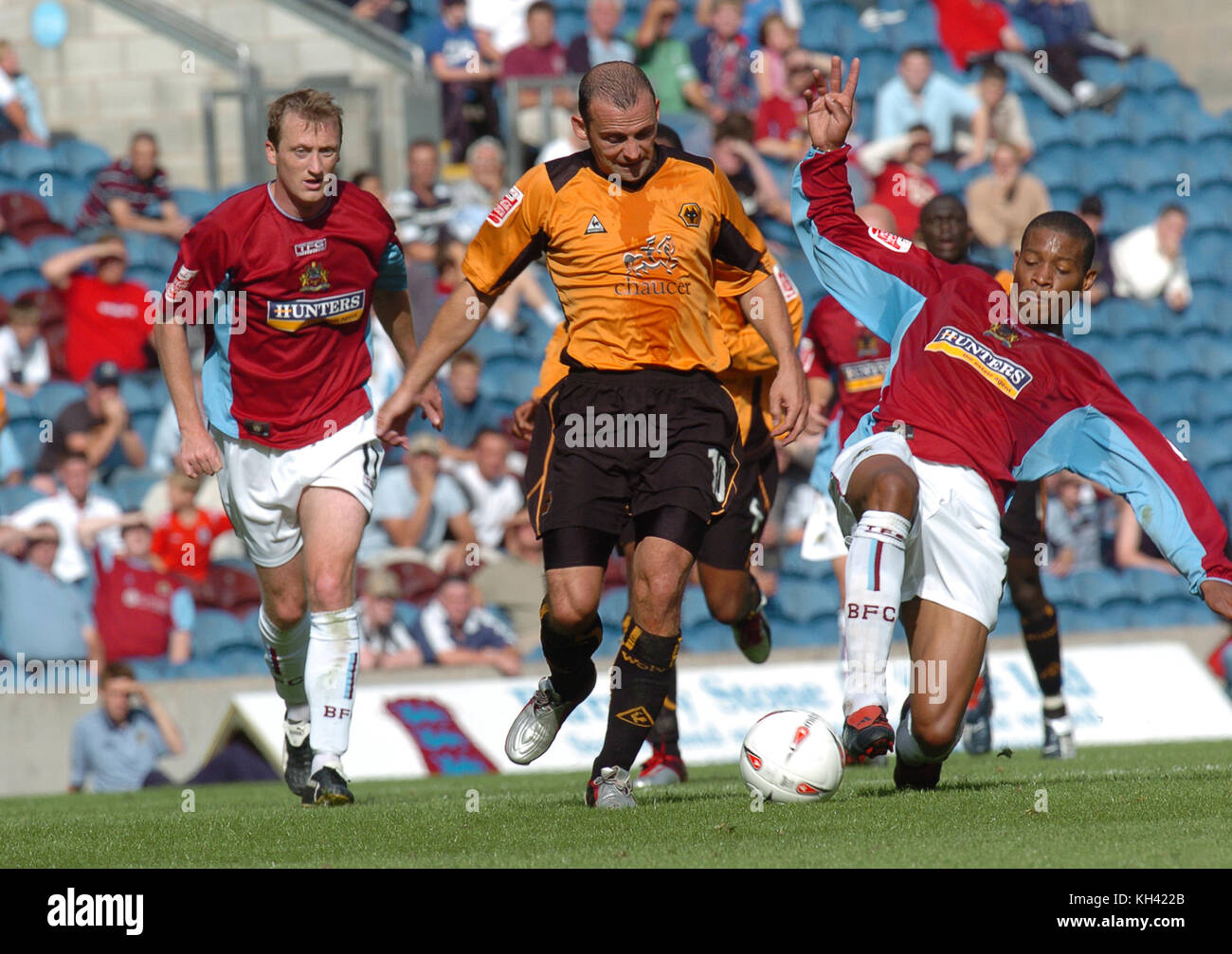 Footballer Colin Cameron between Tony Grant (left) and Micah Hyde ...