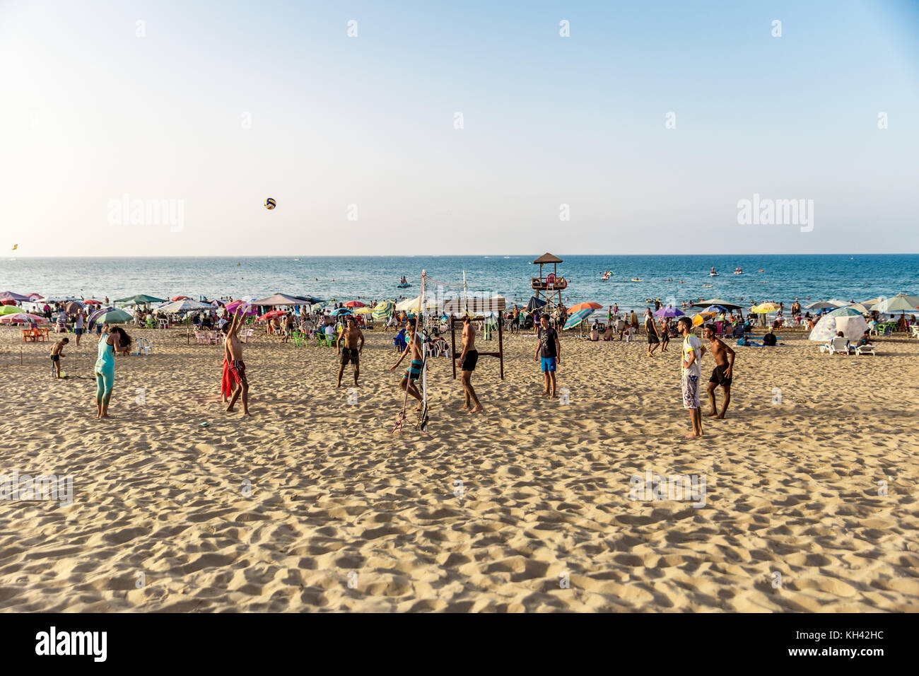 Young people playing volley ball on Saidia beach, in summer Stock Photo ...