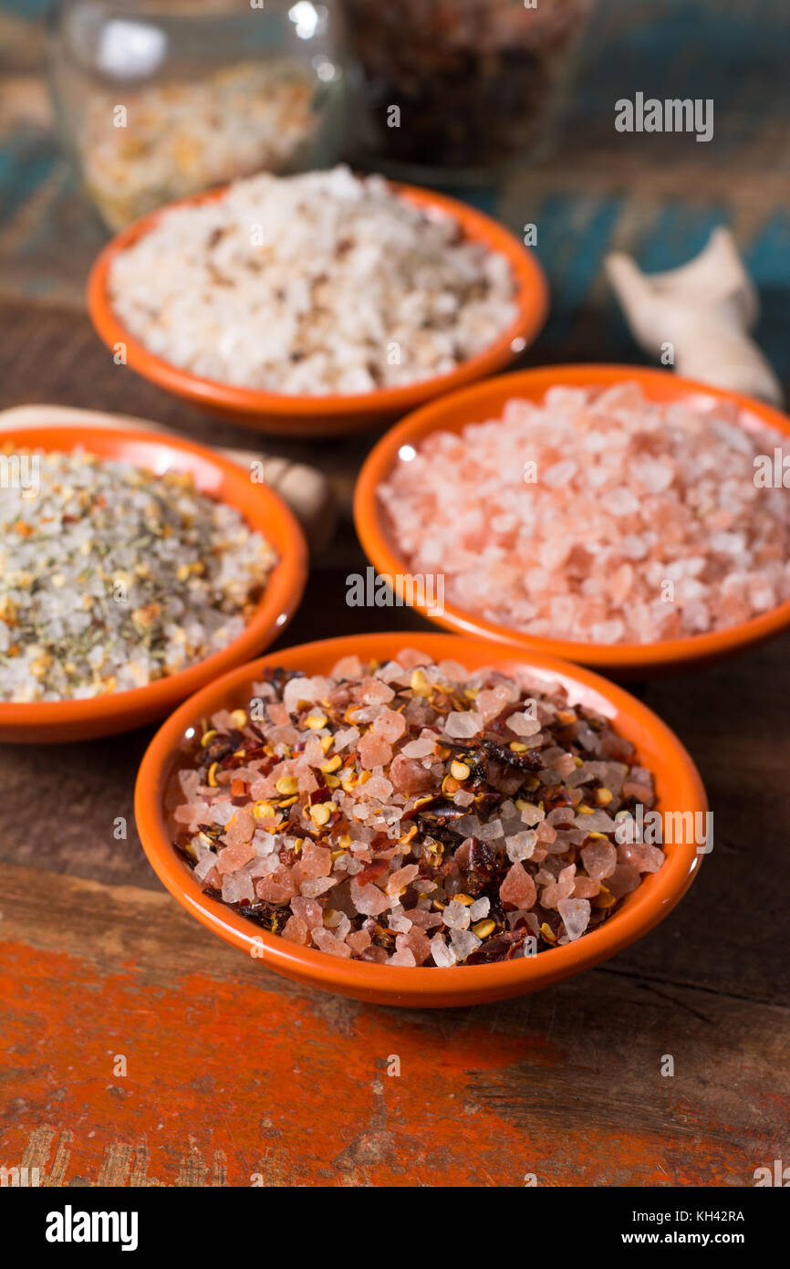 Variety of sea salt, pink Himalayan salt, colorful salt with dried ...