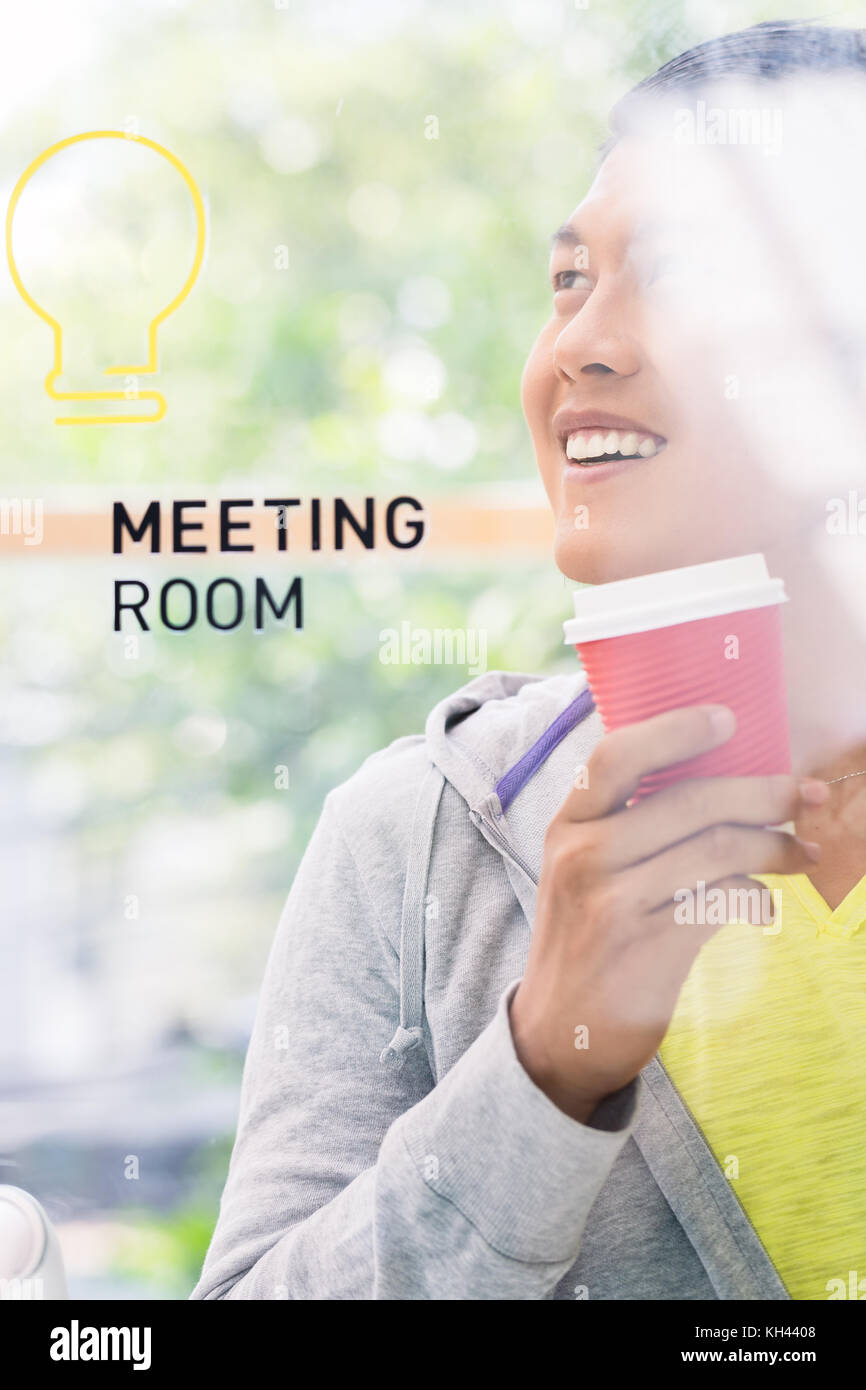 Creative young employee thinking of innovative business ideas Stock ...