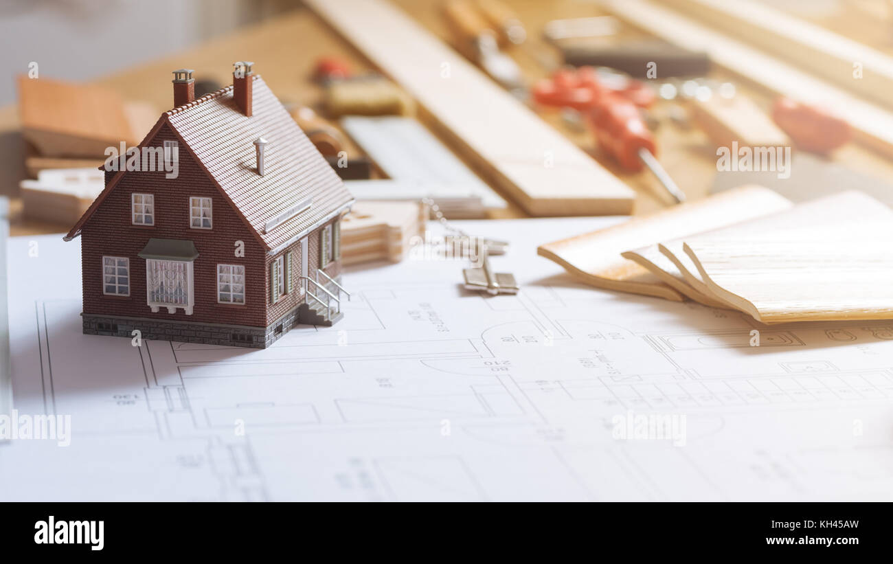 Construction and home renovation concept, model house, work tools ...
