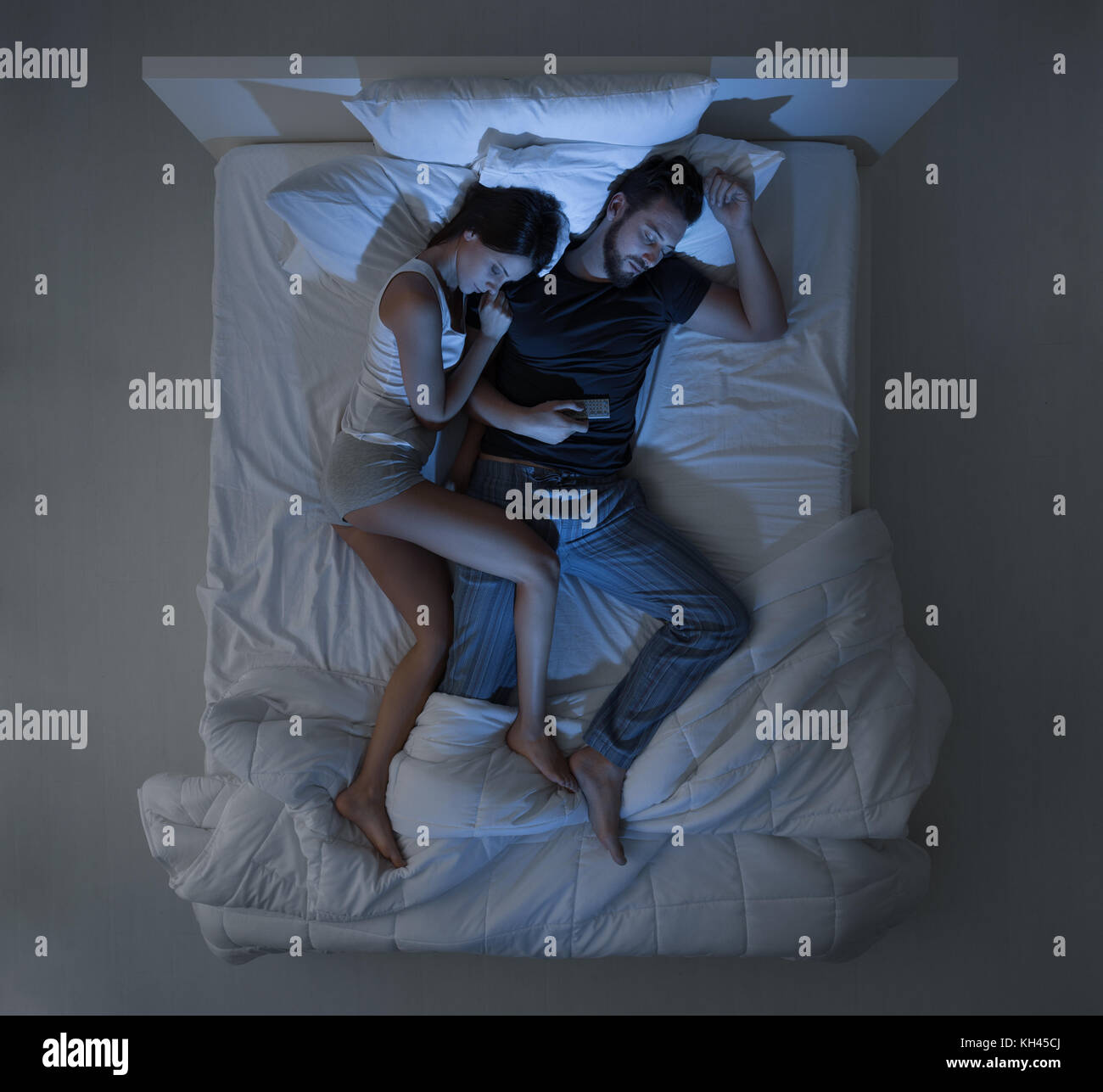 Wife watching husband sleeping hi-res stock photography and images - Alamy