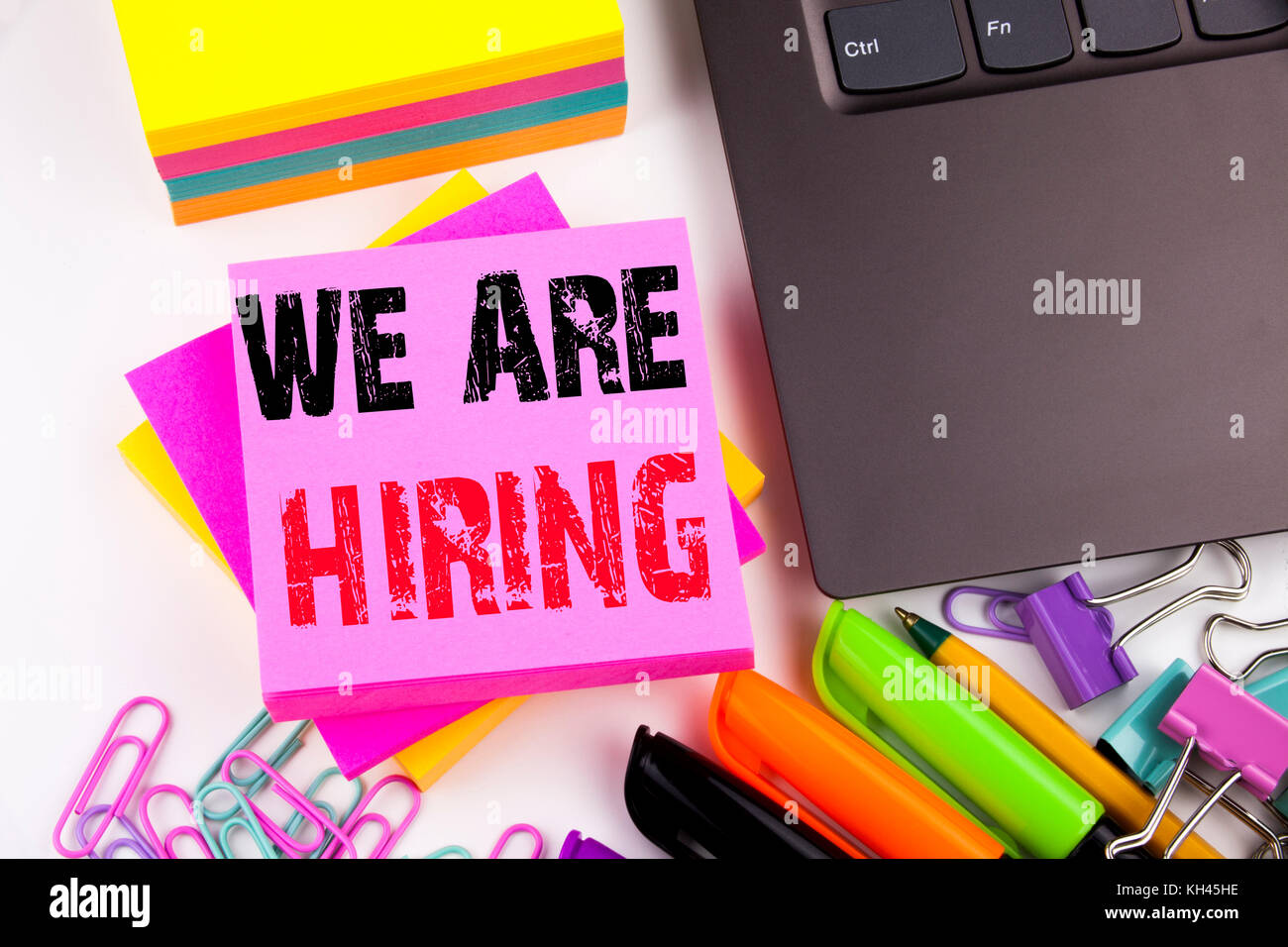 Writing text showing We Are Hiring made in the office with surroundings ...