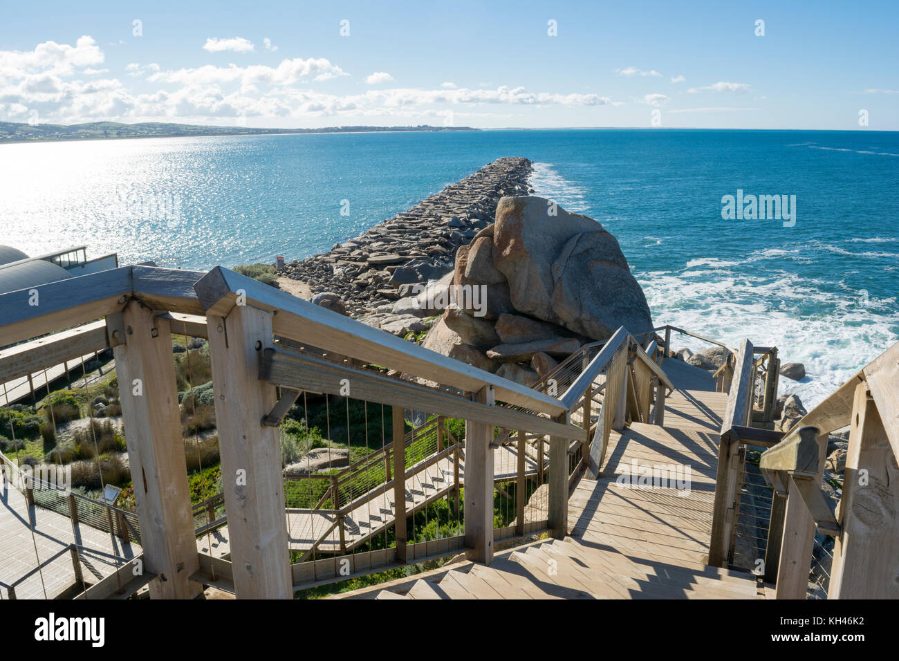 Steps leading down to the rock groyne on Granite Island. Part of the ...