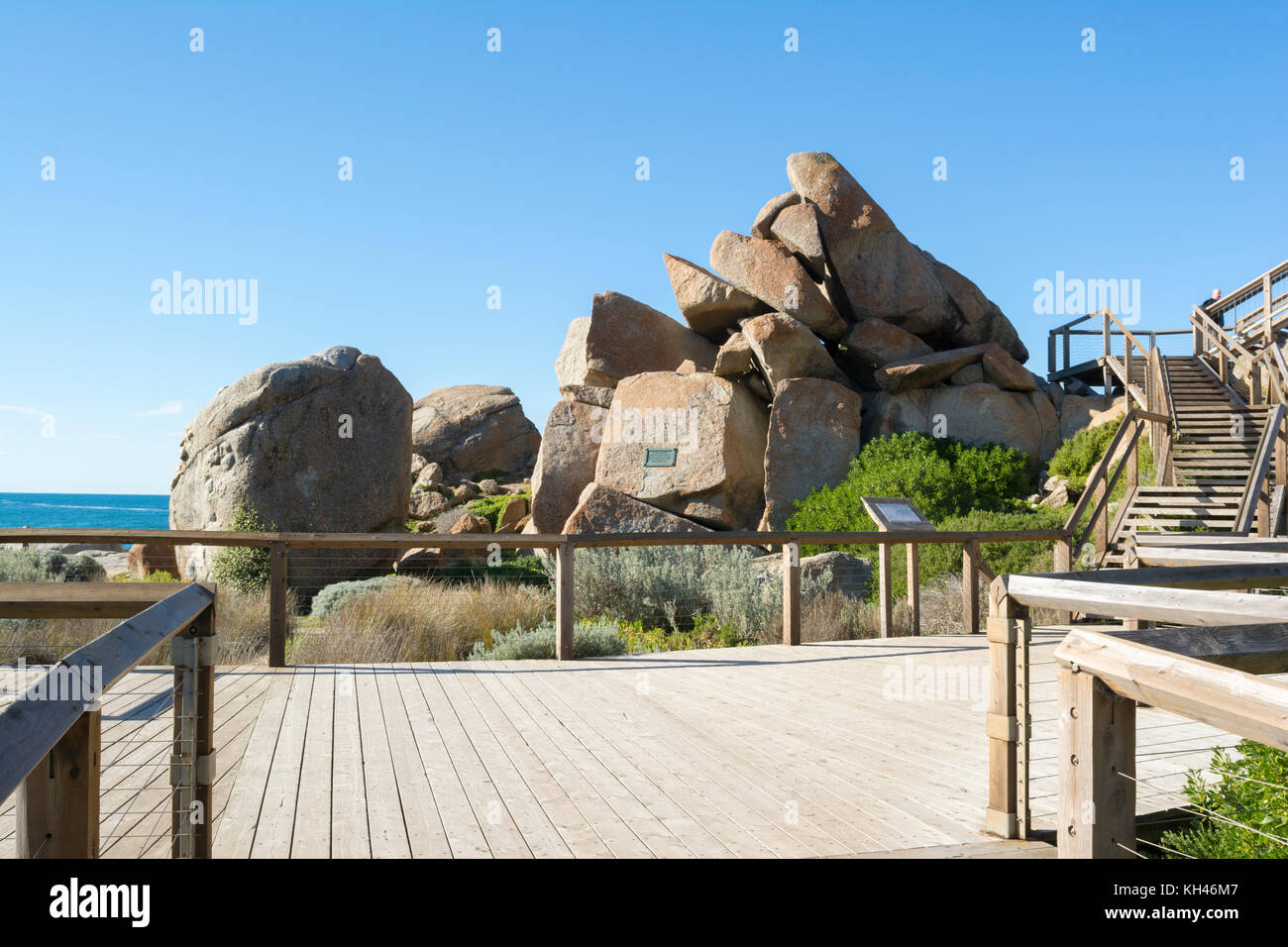 Staircase leading up the granite rock wall enabling easy to reach to ...