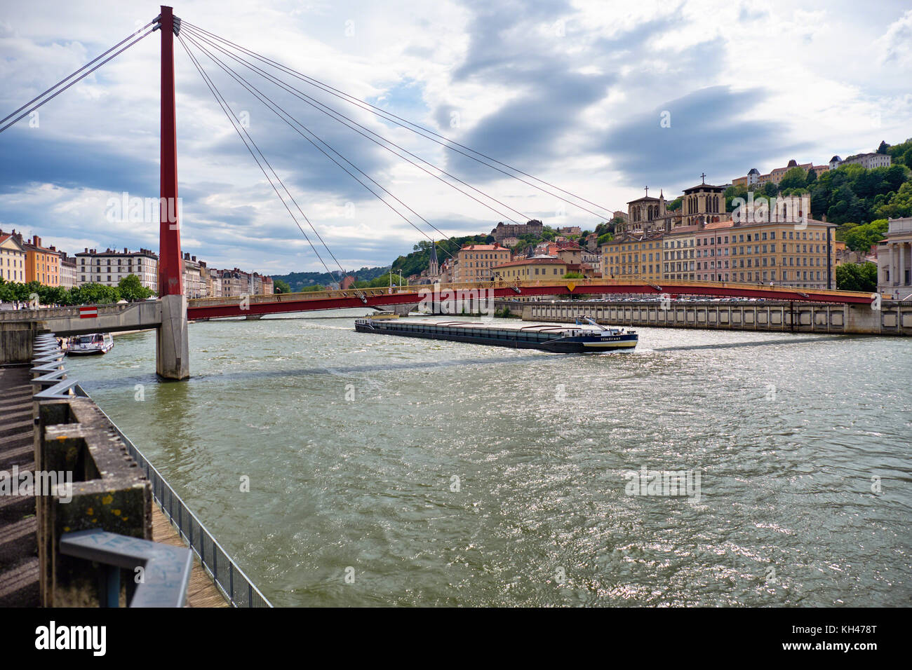 A Barge Passing Under the Gateway Courthouse Footbridge, Lyon, France ...
