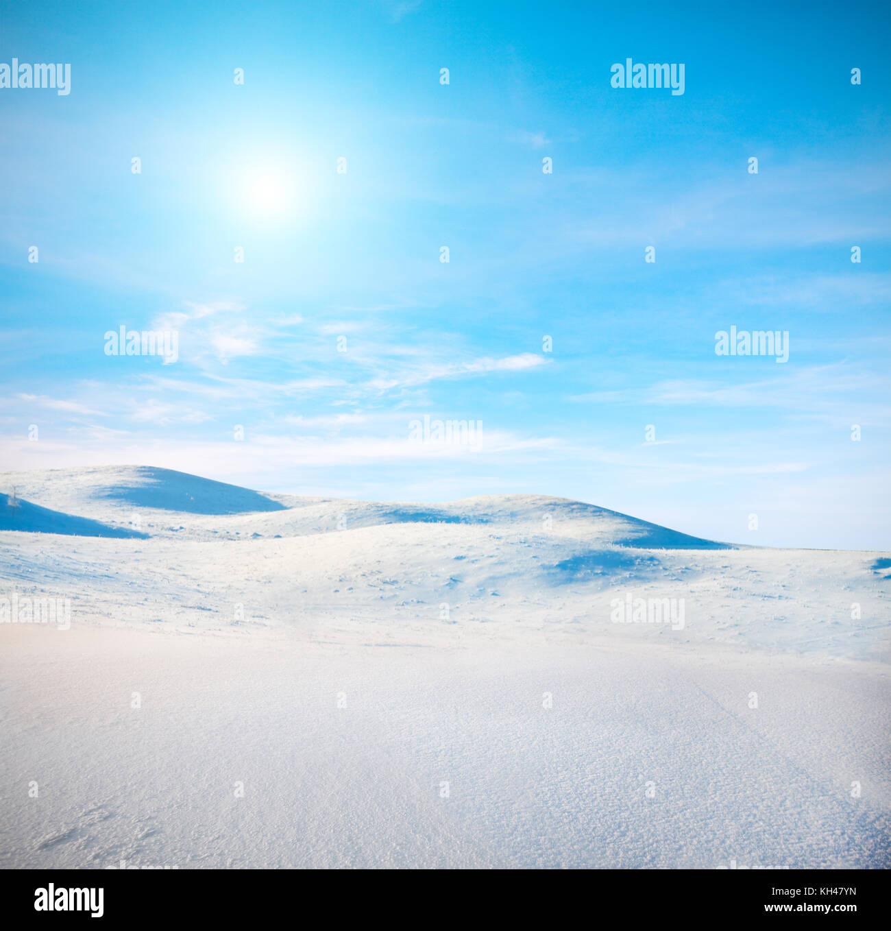 snow hill and blue sky Stock Photo - Alamy