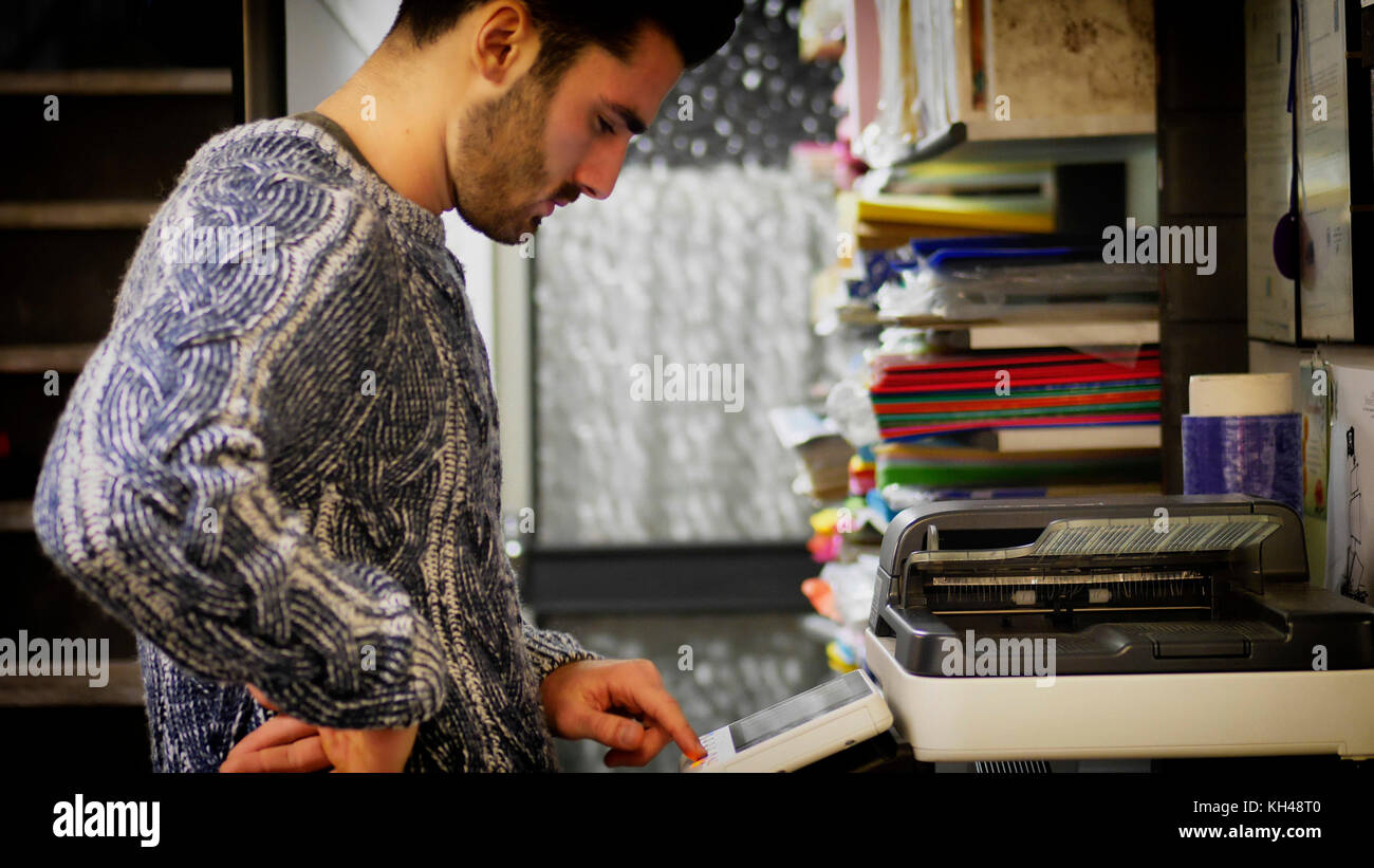 Man using photocopier Stock Photo - Alamy