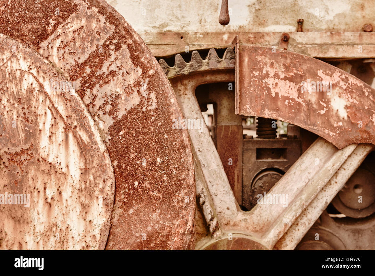 Rusted machinery detail in warm tone. Grunge background Stock Photo - Alamy
